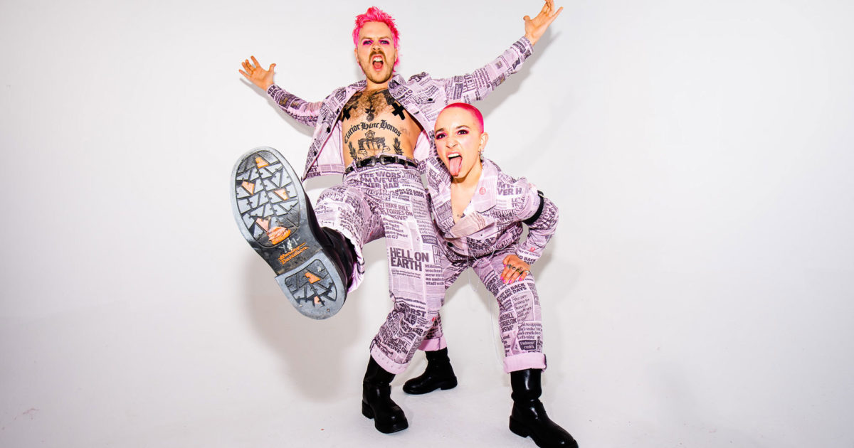 pink suits criticise trickle-down economics with new… | Kerrang!